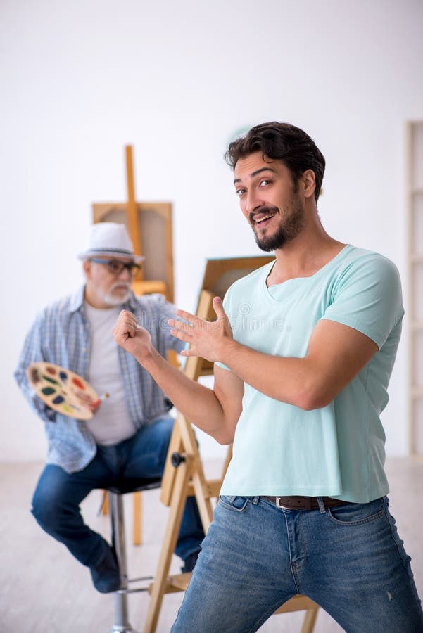 Old Painter and Young Male Model at the Studio Stock Photo - Image of ...