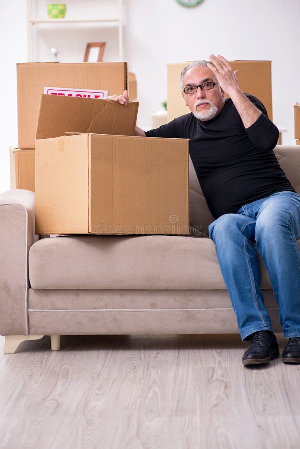 Old Male Professional Mover Doing Home Relocation Stock Photo - Image ...