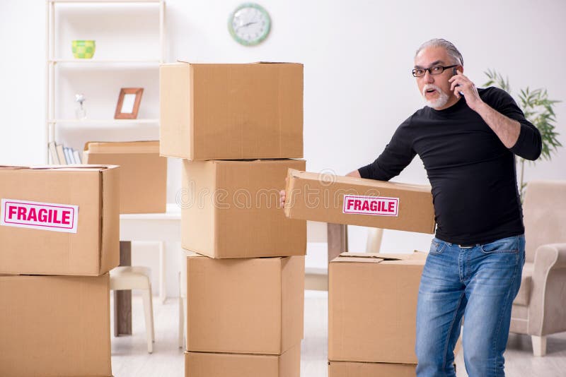 Old Male Professional Mover Doing Home Relocation Stock Photo - Image ...