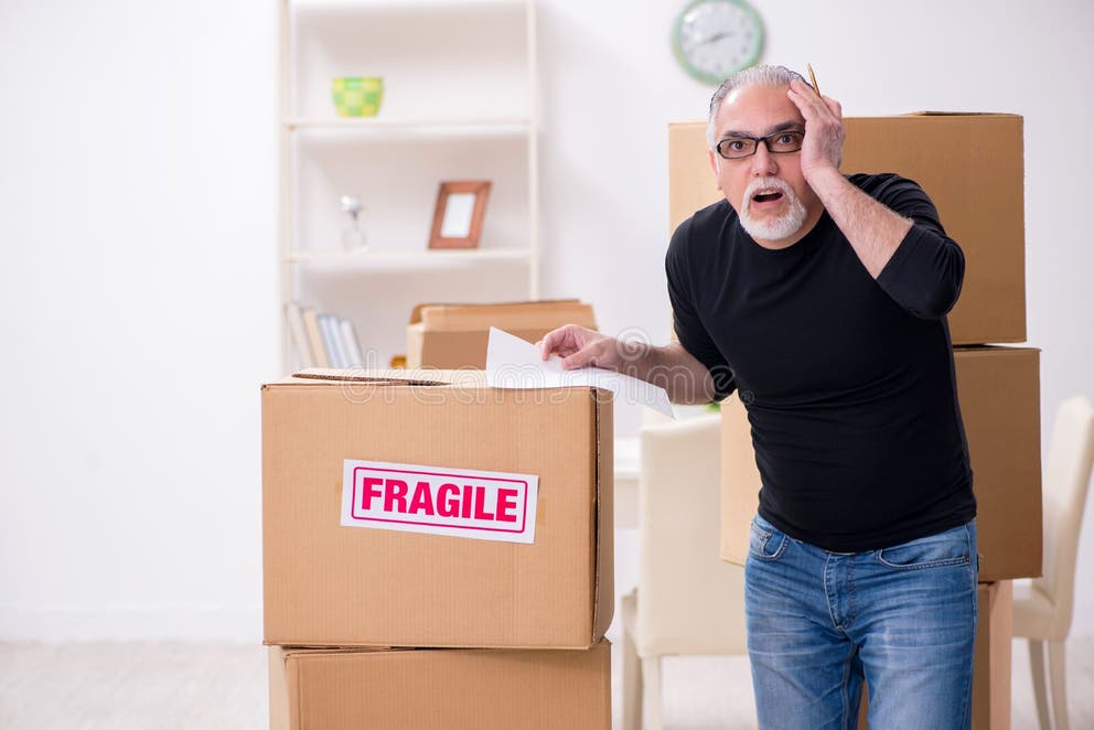 Old Male Professional Mover Doing Home Relocation Stock Photo - Image ...