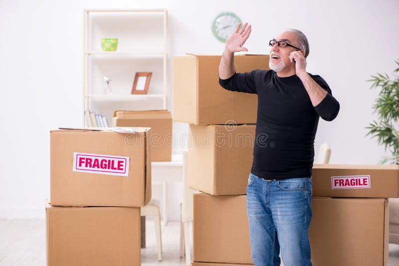Old Male Professional Mover Doing Home Relocation Stock Image - Image ...