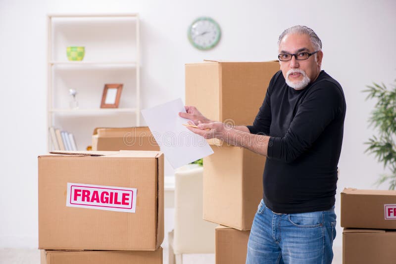 Old Male Professional Mover Doing Home Relocation Stock Photo - Image ...