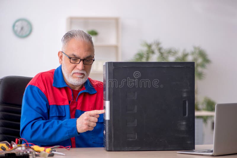 Old Male Repairman Repairing Computer Stock Image - Image of soldering ...