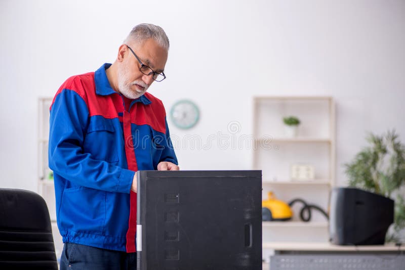 Old Male Repairman Repairing Computer Stock Photo - Image of electronic ...