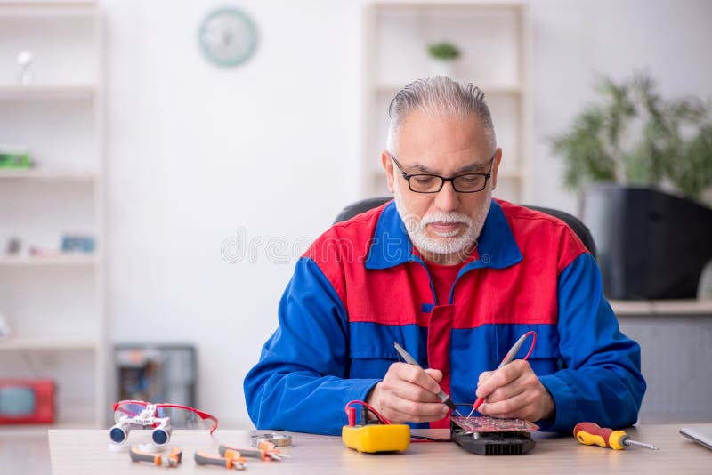Old Male Repairman Repairing Computer Stock Photo - Image of support ...