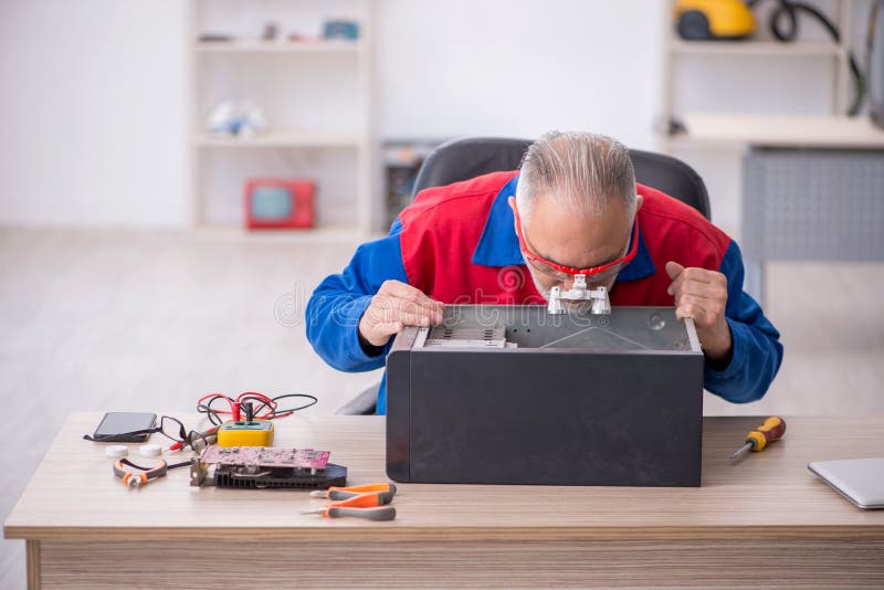 Old Male Repairman Repairing Computer Stock Photo - Image of processor ...