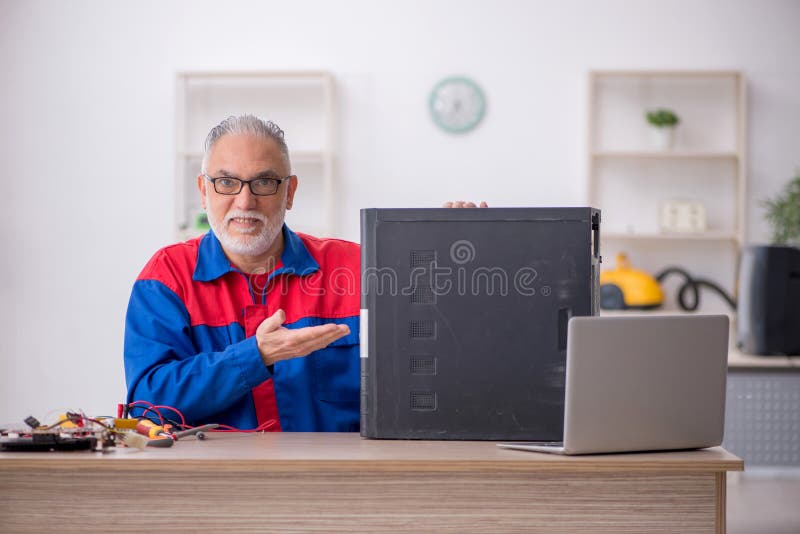 Old Male Repairman Repairing Computer Stock Image - Image of presenting ...