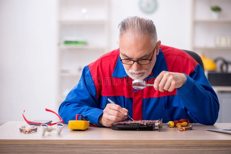 Old Male Repairman Repairing Computer Stock Photo - Image of repairing ...