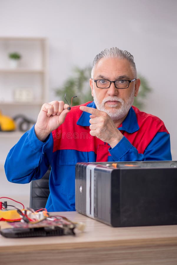 Old Male Repairman Repairing Computer Stock Image - Image of parts ...