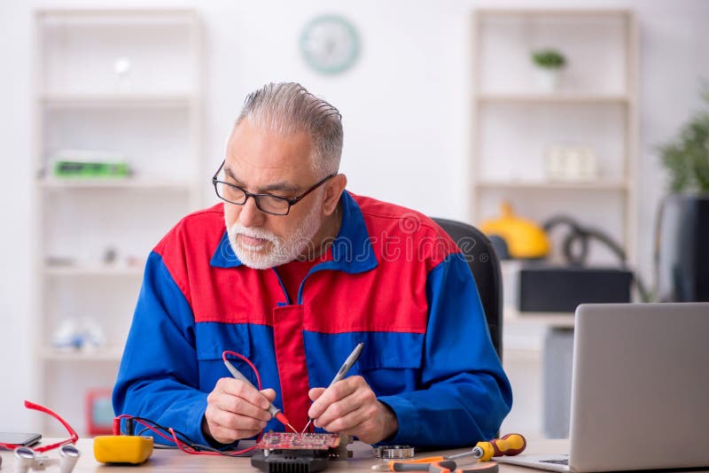 Old Male Repairman Repairing Computer Stock Image - Image of technology ...
