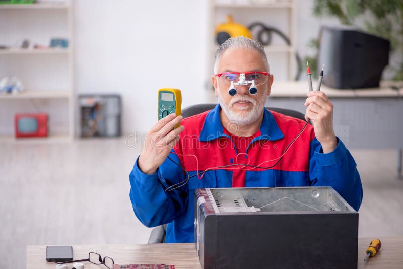 Old Male Repairman Repairing Computer Stock Photo - Image of contractor ...