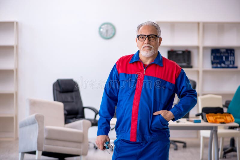 Old Male Repairman Working at Workshop Stock Image - Image of ...
