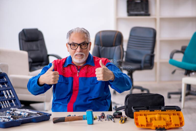 Old Male Repairman Working at Workshop Stock Photo - Image of house ...
