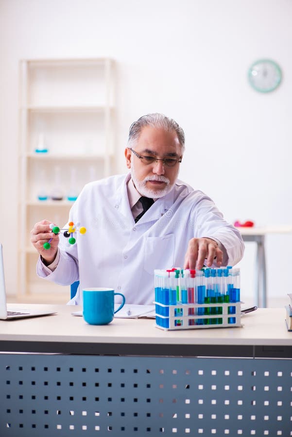 Old Male Scientist Studying Molecular Model Stock Photo - Image of atom ...