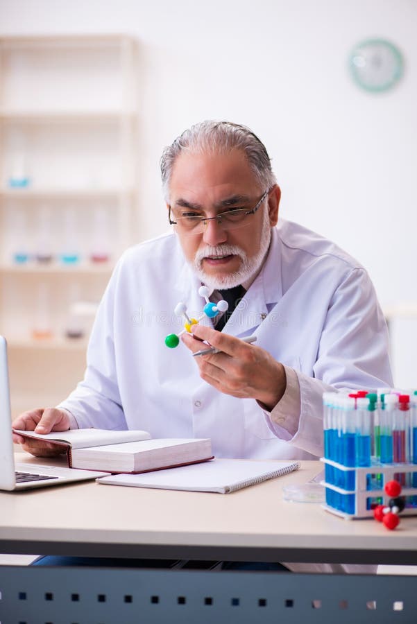 Old Male Scientist Studying Molecular Model Stock Image - Image of ...
