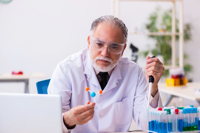 Old Male Scientist Studying Molecular Model Stock Image - Image of ...