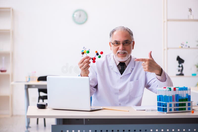Old Male Scientist Studying Molecular Model Stock Photo - Image of ...