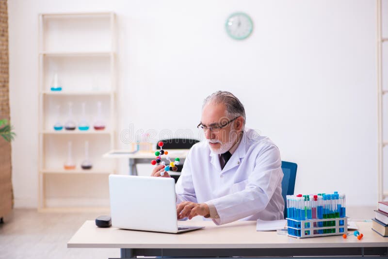 Old Male Scientist Studying Molecular Model Stock Image - Image of atom ...