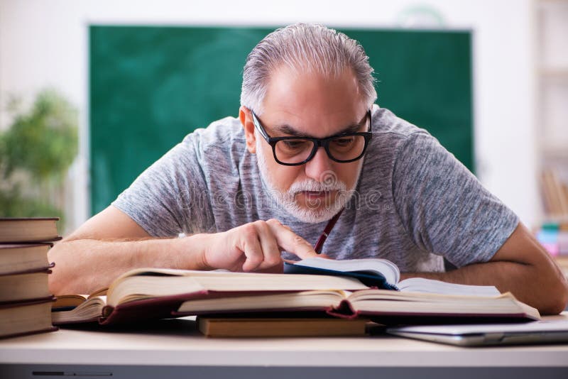 Old Male Student Preparing for Exams in the Classroom Stock Photo ...