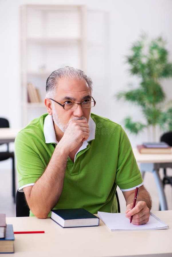 Old Male Student Preparing for Exams in the Classroom Stock Photo ...