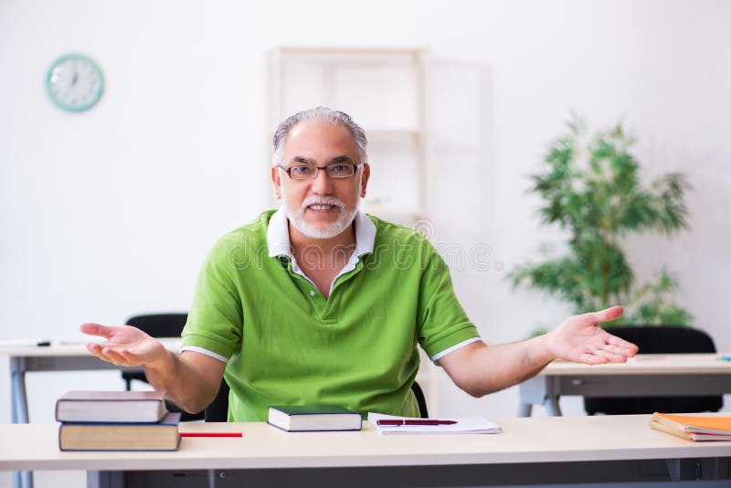 Old Male Student Preparing for Exams in the Classroom Stock Image ...