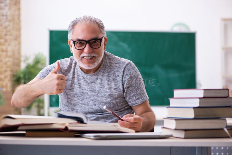 Old Male Student Preparing for Exams in the Classroom Stock Photo ...