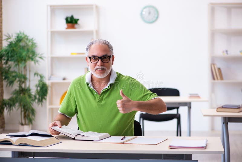 Old Male Student Preparing for Exams in the Classroom Stock Photo ...