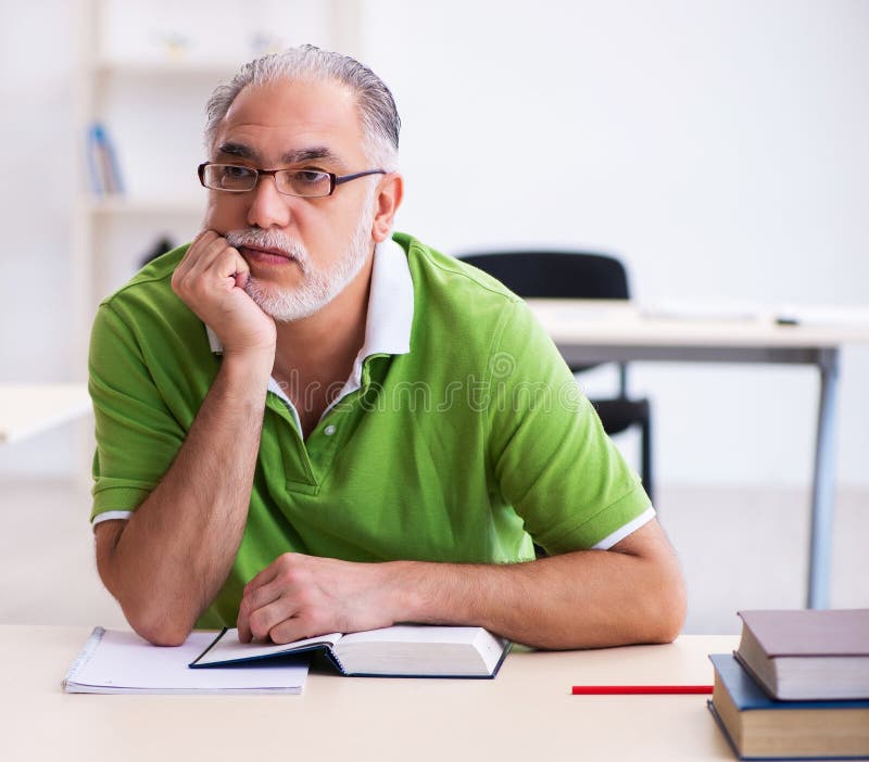 Old Male Student Preparing for Exams in the Classroom Stock Image ...