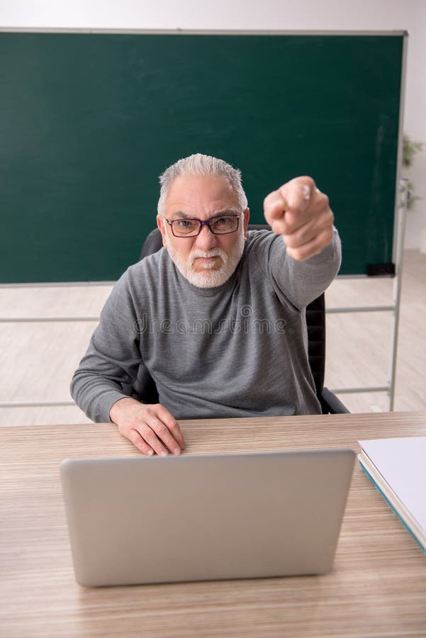 Old Male Teacher in the Classroom Stock Photo - Image of book, angry ...