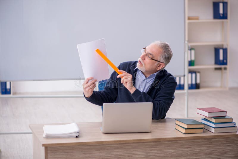 Old Male Teacher in the Classroom Stock Image - Image of notes ...