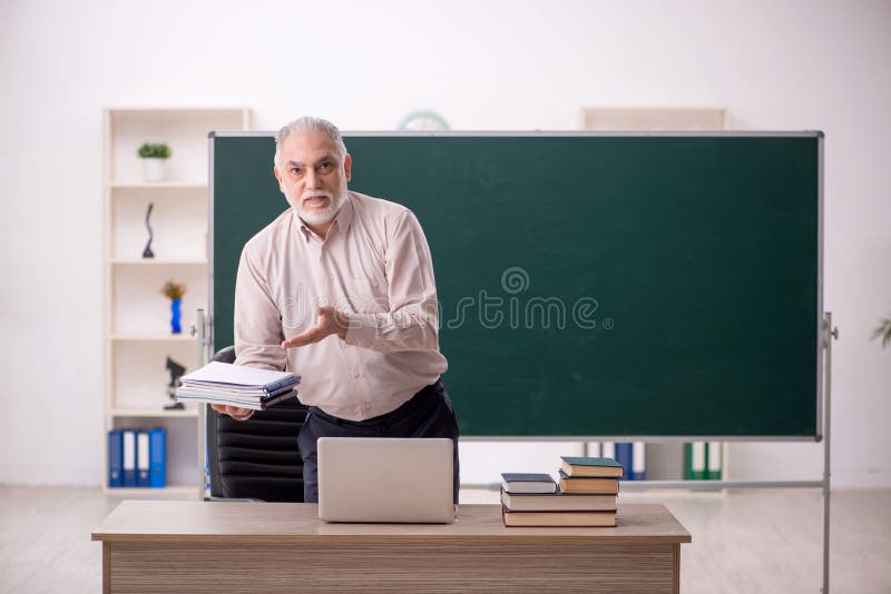 Old Male Teacher in the Classroom Stock Image - Image of university ...