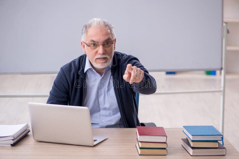 Old Male Teacher in the Classroom Stock Image - Image of studying ...