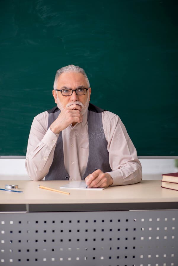 Old Male Teacher in the Classroom Stock Image - Image of taking ...