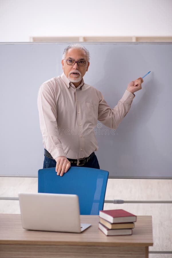 Old Male Teacher in Front of Whiteboard Stock Photo - Image of ...