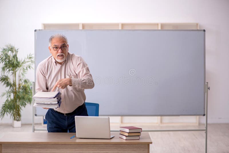 Old Male Teacher in Front of Whiteboard Stock Photo - Image of lesson ...