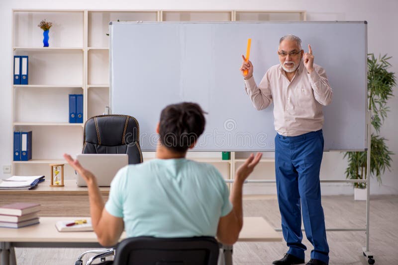Old Male Teacher and Young Male Student in the Classroom Stock Photo - Image of explaining ...