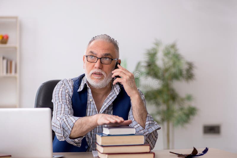 Old Male Writer Sitting at Workplace Stock Image - Image of calling ...