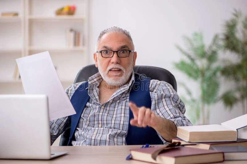Old Male Writer Sitting at Workplace Stock Photo - Image of writing ...