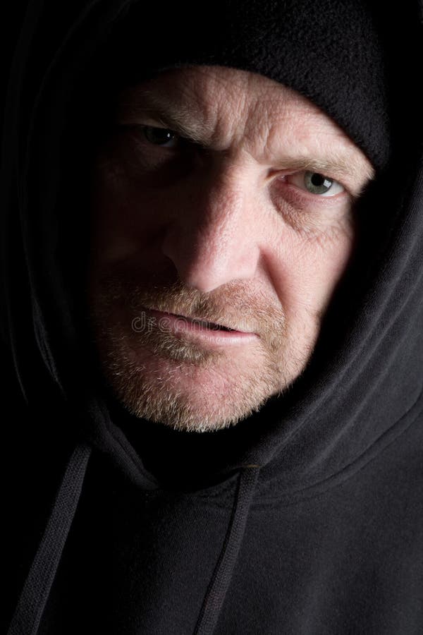 Menacing Looking Man with Orange Eyes Stock Image - Image of close ...
