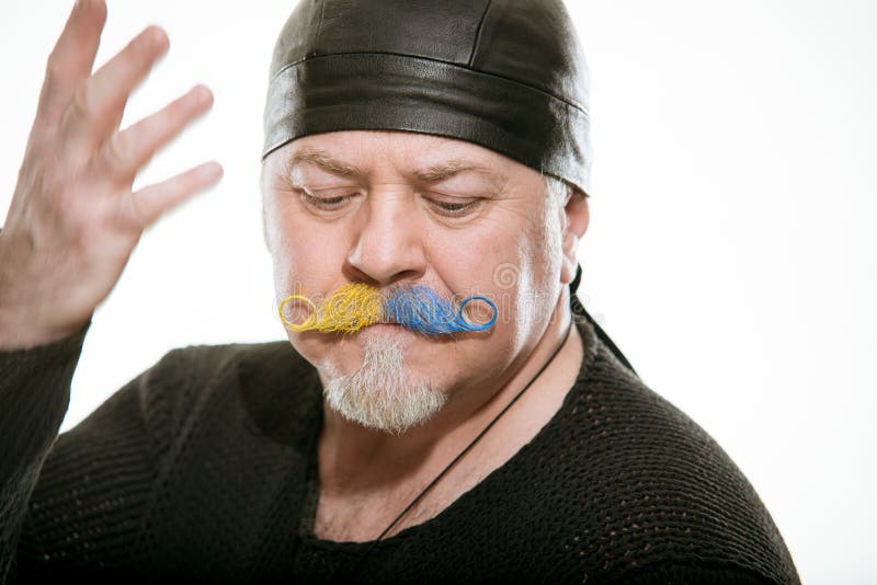 Adult Man with a Mustache in a Cap and a Waistcoat with a Butterfly ...