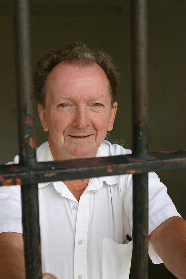 Old man behind bars stock image. Image of florida, court - 1205481
