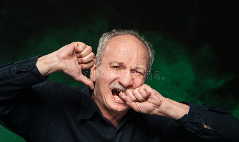 Old man biting his hands stock image. Image of hurt, adults - 29427349