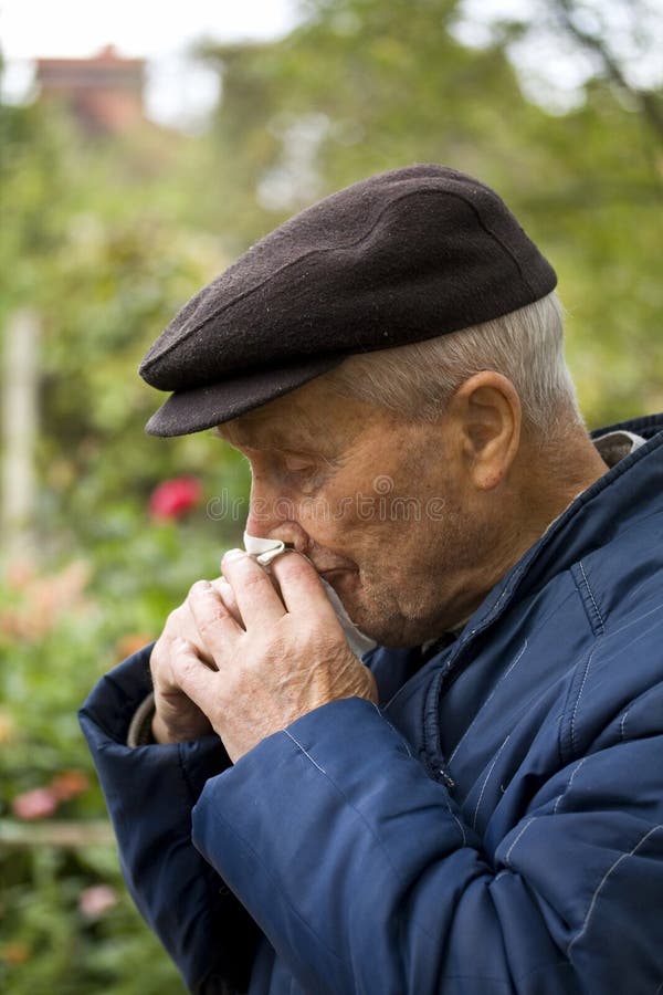 Old man blowing his nose stock image. Image of cute, healthcare - 16378151