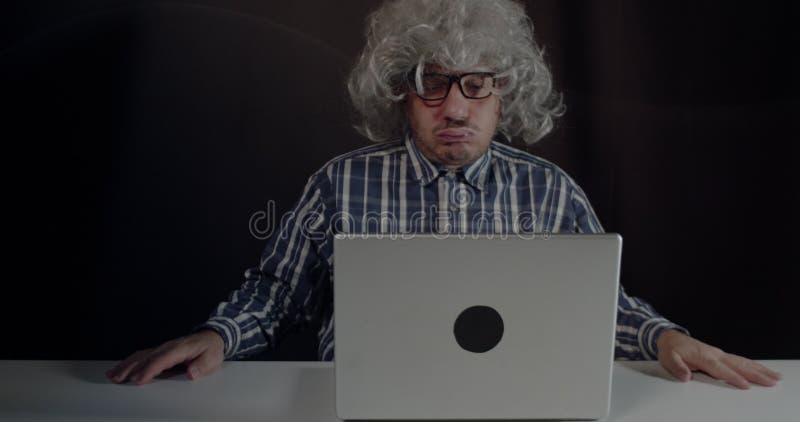 An Old Man Boomer Spreads His Arms Distraught in Front a Computer Stock ...