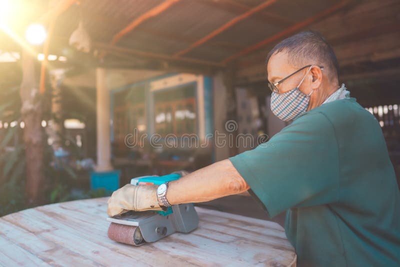 Old Man of Carpenter Working with Machine on Table Stock Photo - Image ...