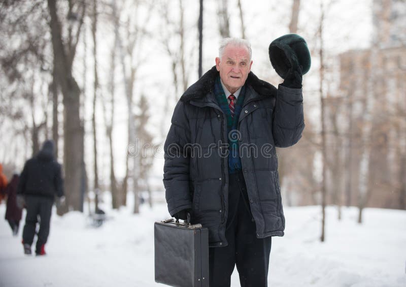 An Old Man with Case Takes Off His Hat Outdoors Stock Image - Image of ...