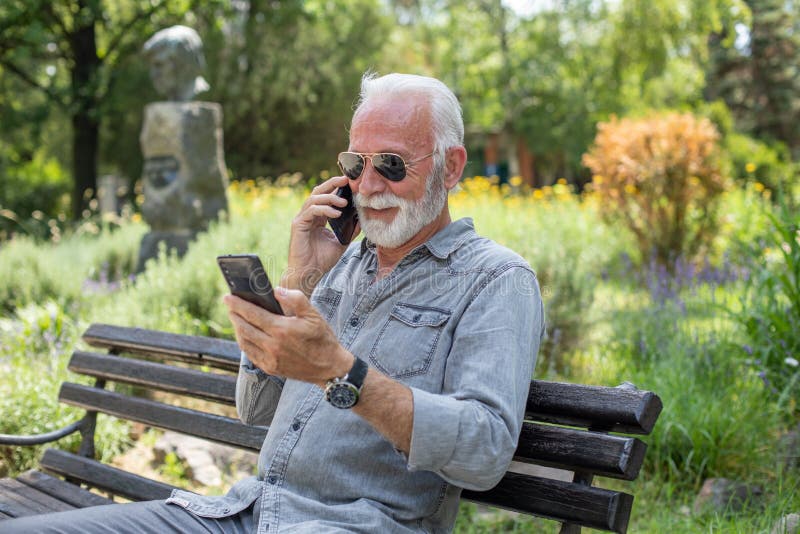 Old Man Compare Two Smartphones Stock Image - Image of gadgets, adult ...
