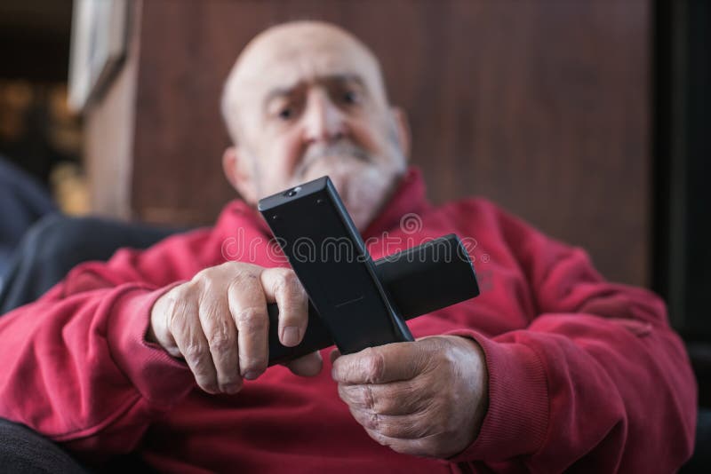 Elderly Man Confused with Tv Remote Controls Stock Image - Image of ... Elderly Man Confused with Tv Remote Controls Stock Image - Image of ...