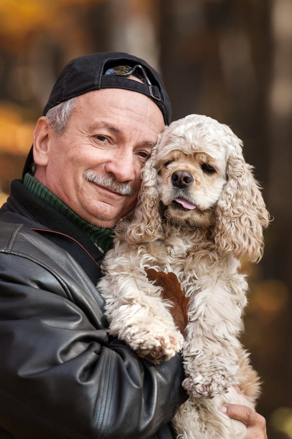 Old man with dog stock image. Image of handsome, cheerful - 28247347