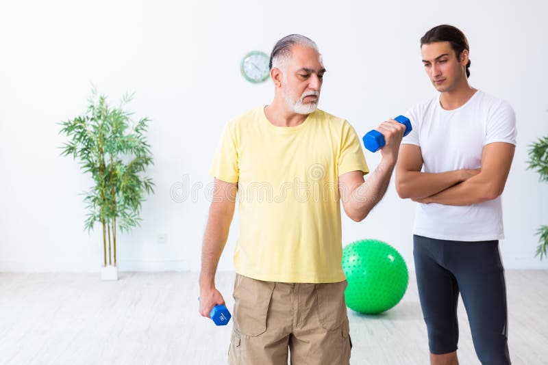 Old Man Doing Exercises Indoors Stock Photo - Image of coach, mature ...